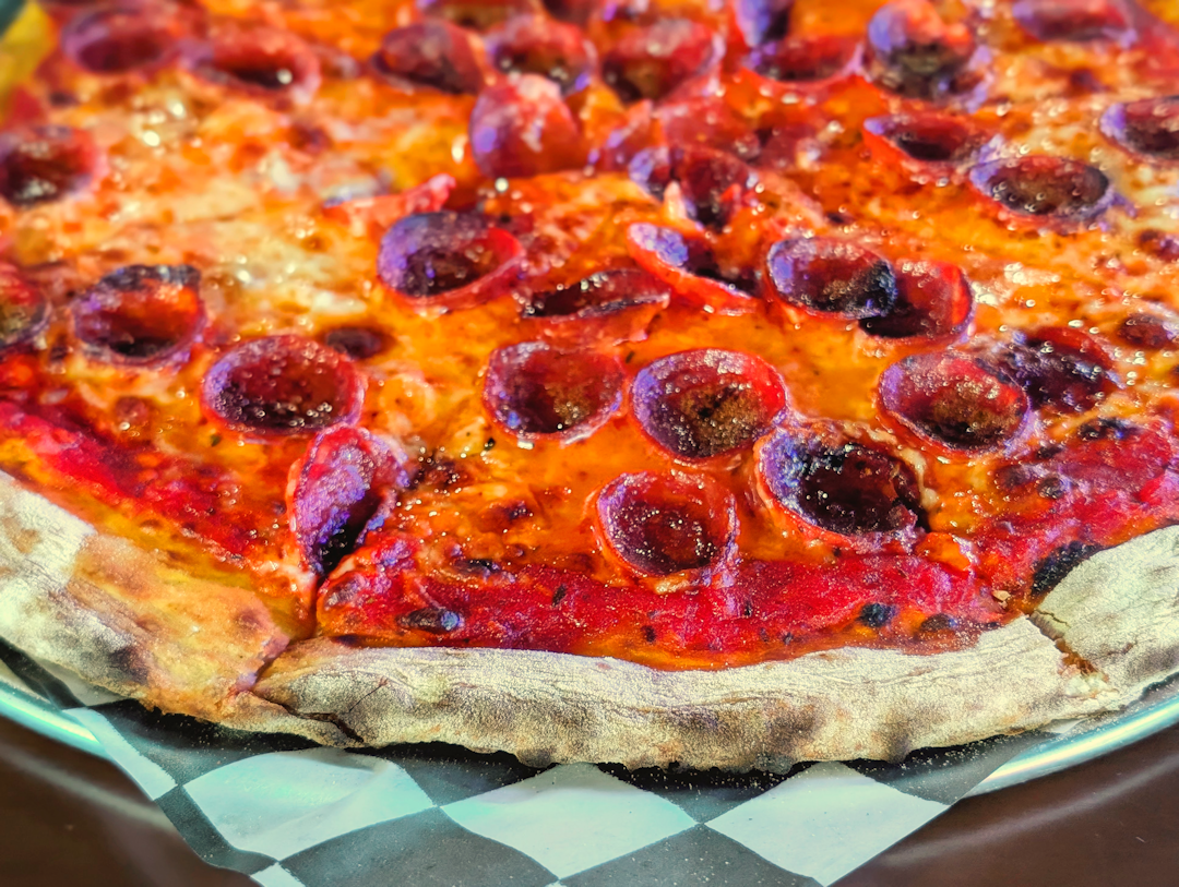 The Essence Of American Pizza - Satisfying Slice